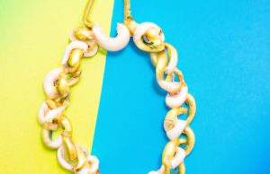 Puka Shell Necklace Meaning: History And Symbolism - Symbol Genie